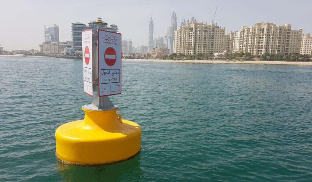 Installation of custom signage buoys - North West Marine